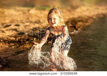 Little Girl By River Image & Photo (Free Trial) | Bigstock
