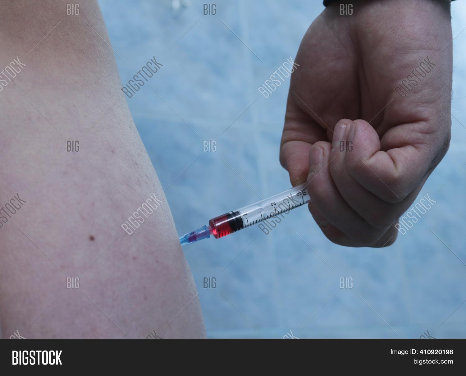 Man Putting Injection Image & Photo (Free Trial) | Bigstock