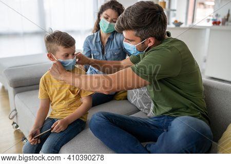 Beautiful Young Family Wearing Face Masks Against Coronavirus - Stock ...
