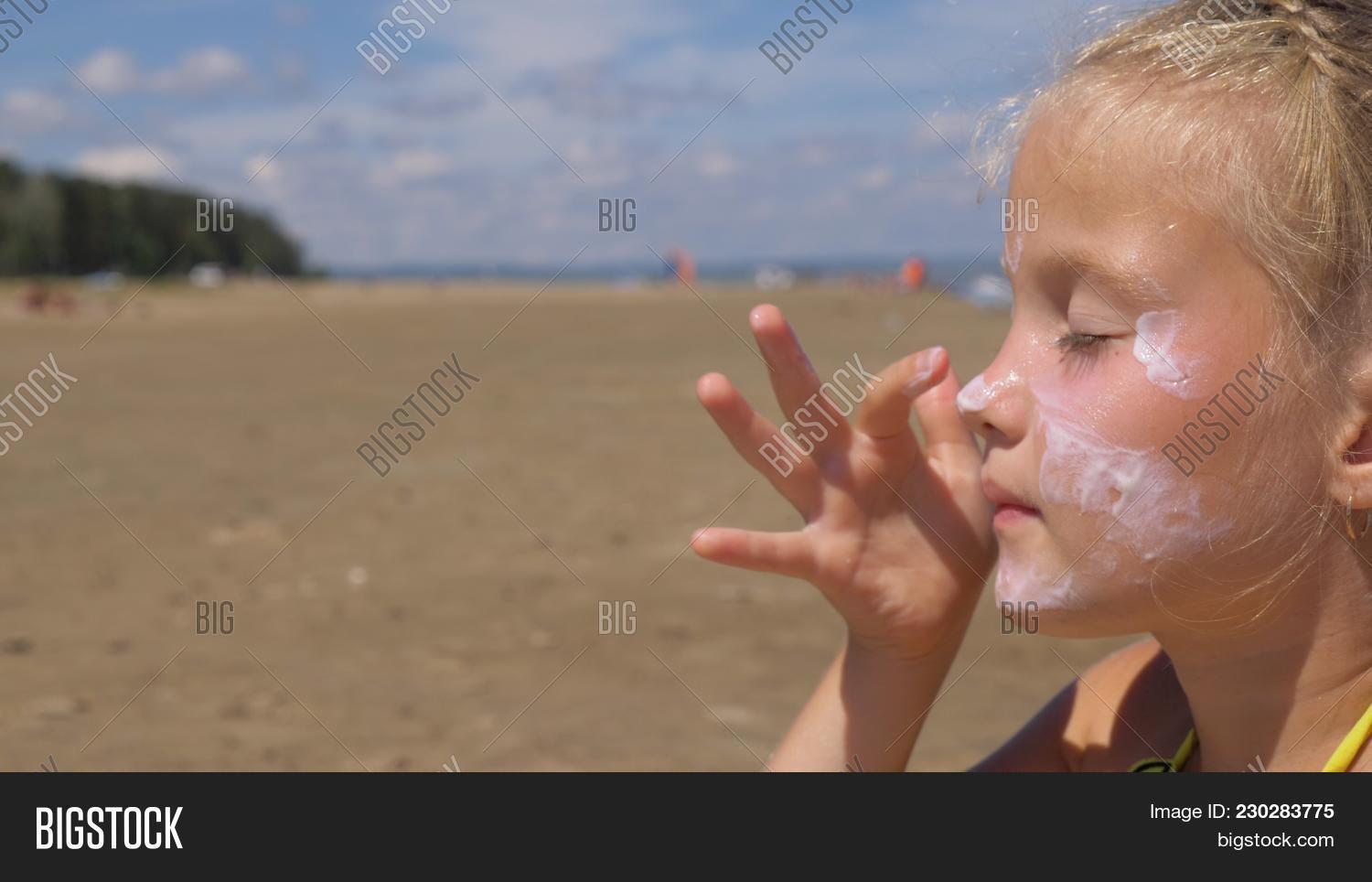 Girl Apply Sunscreen Image & Photo (Free Trial) | Bigstock