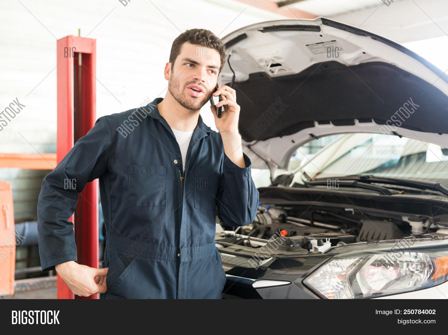 Male Mechanic Talking Image & Photo (Free Trial) | Bigstock