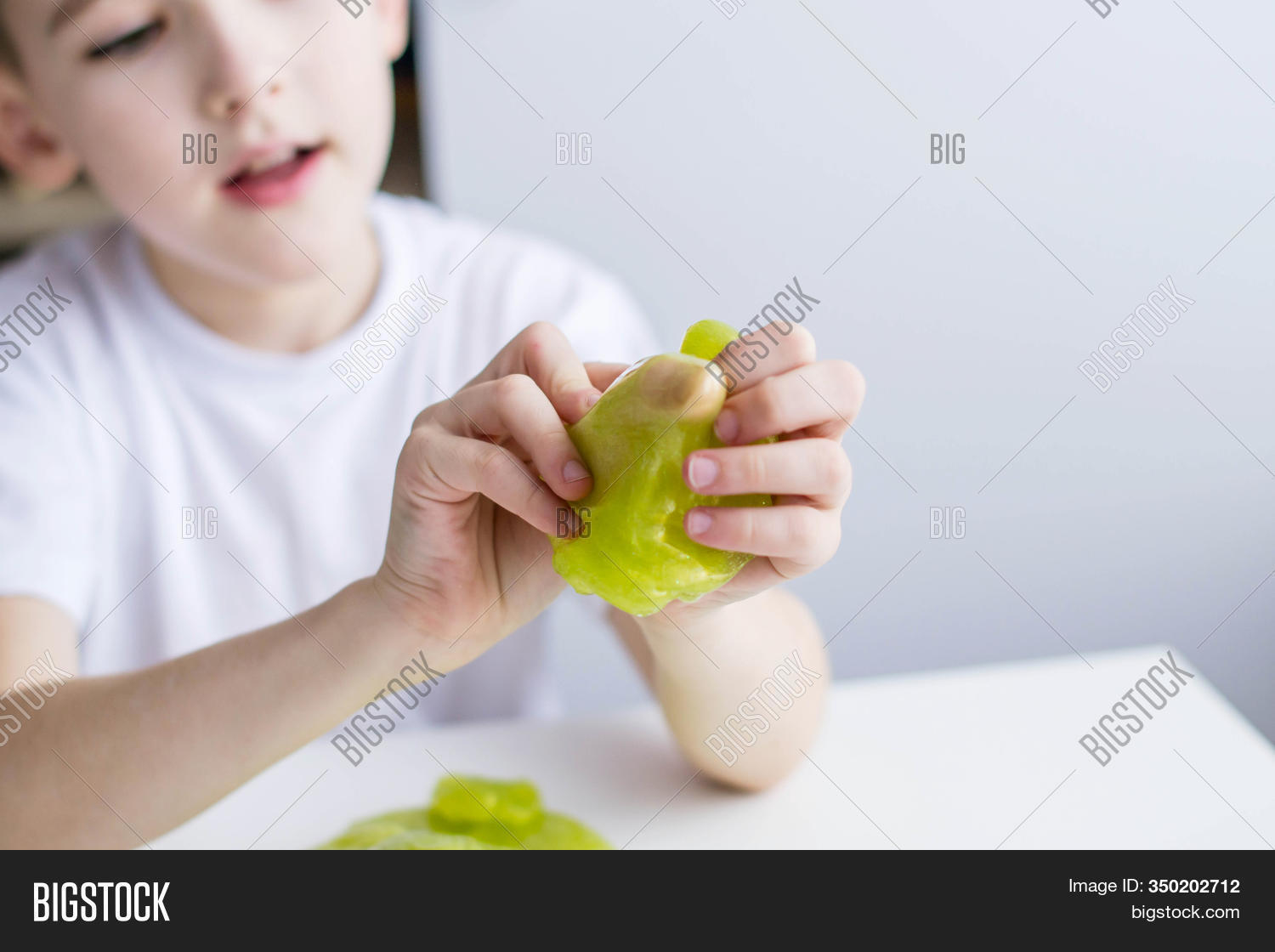Hand Slime. Boy Plays Image & Photo (Free Trial) | Bigstock