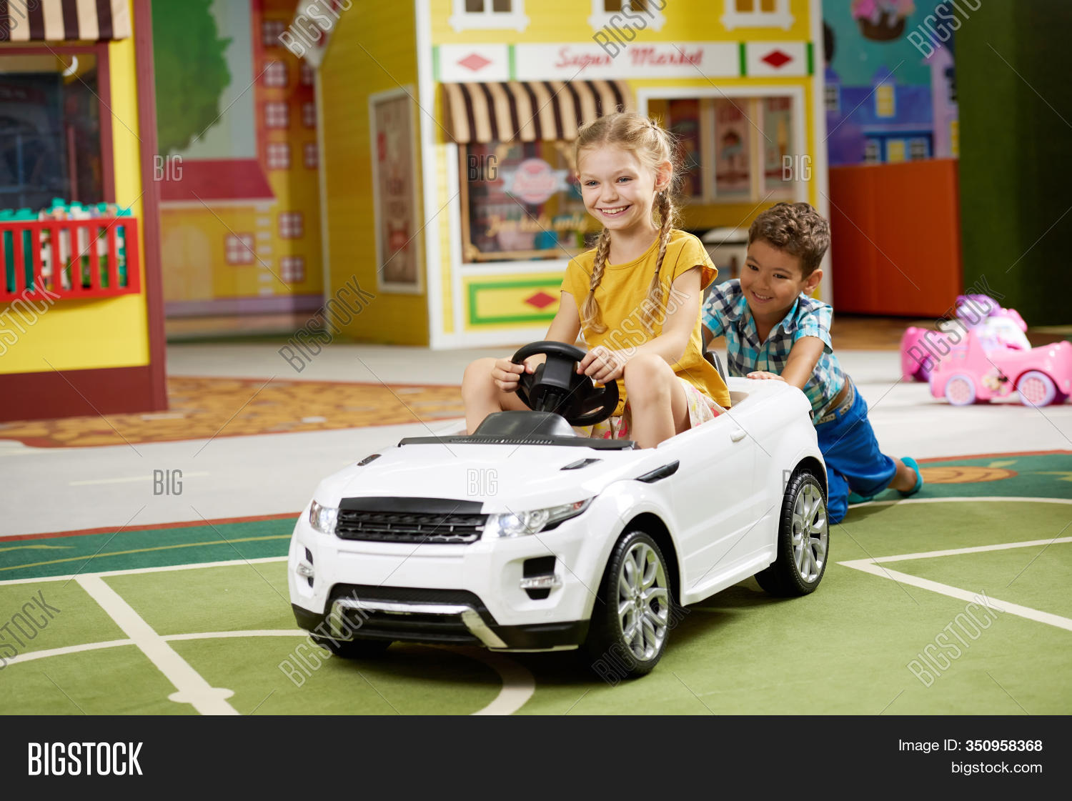 Boy Pushing Little Image & Photo (Free Trial) | Bigstock