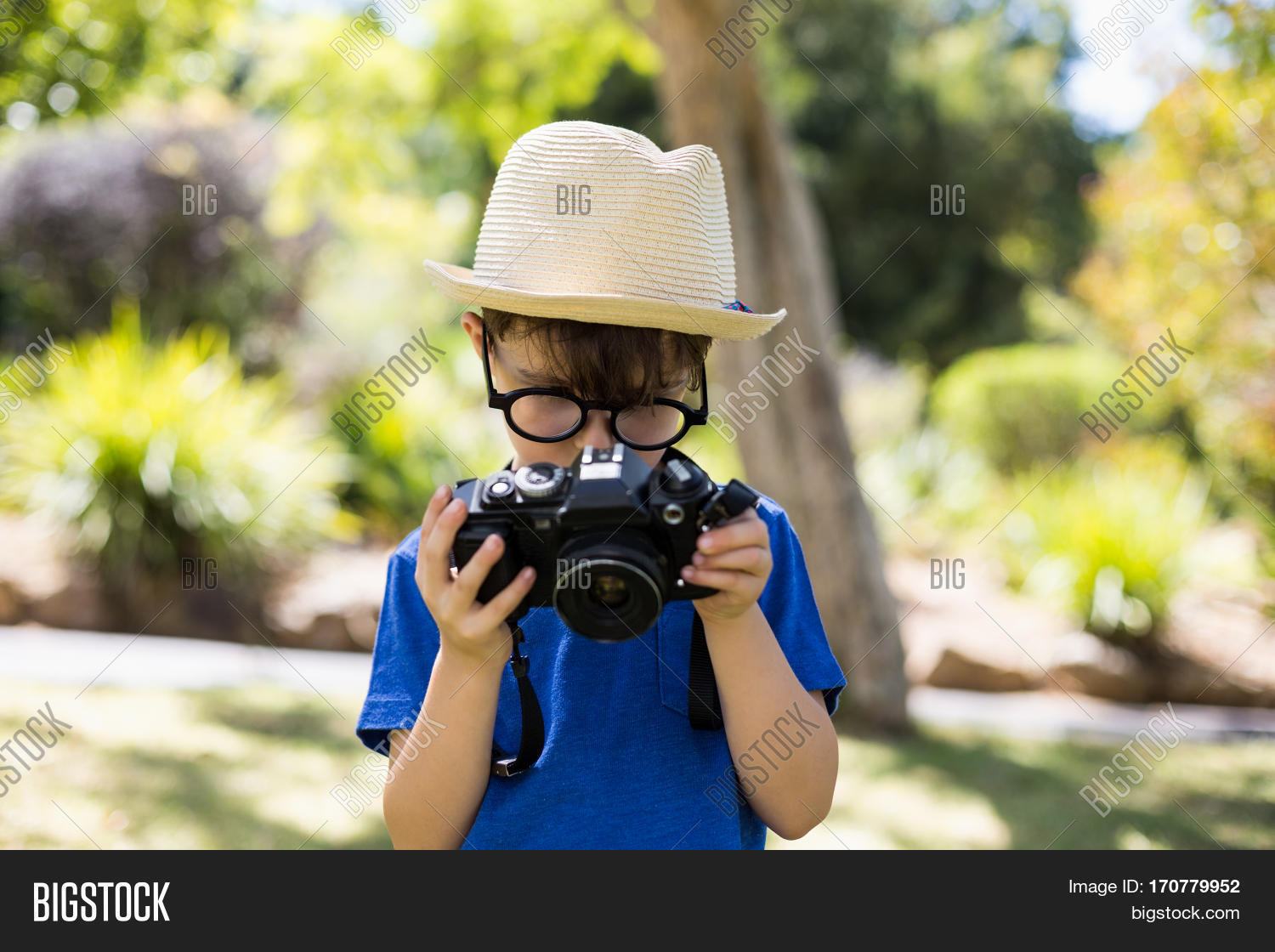 Young Boy Checking Image & Photo (Free Trial) | Bigstock
