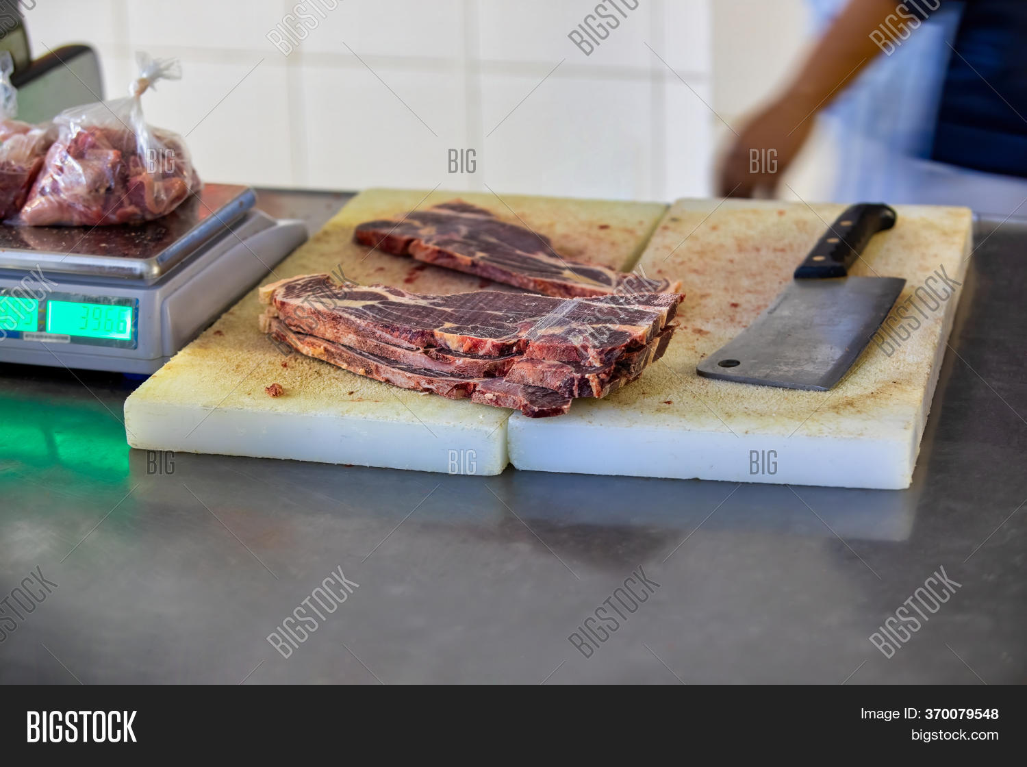 Butcher Cutting Frozen Image & Photo (Free Trial) | Bigstock