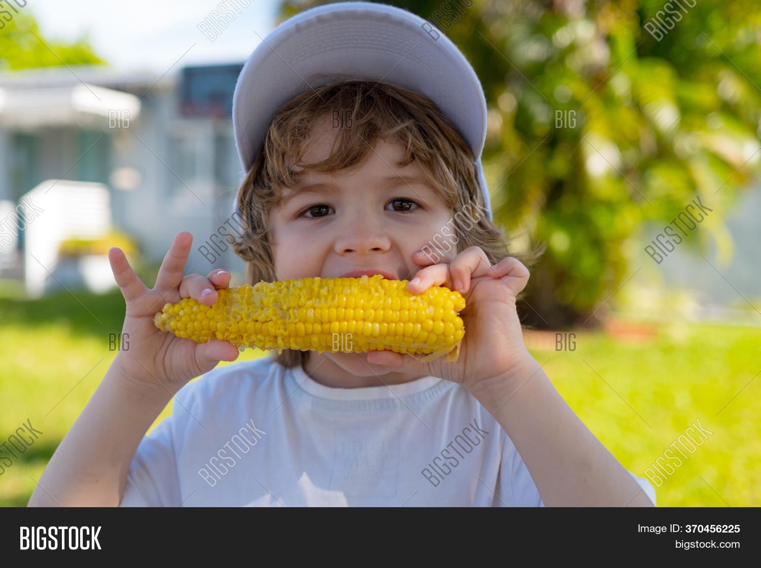 Kids Eating Corn. Food Image & Photo (Free Trial) | Bigstock