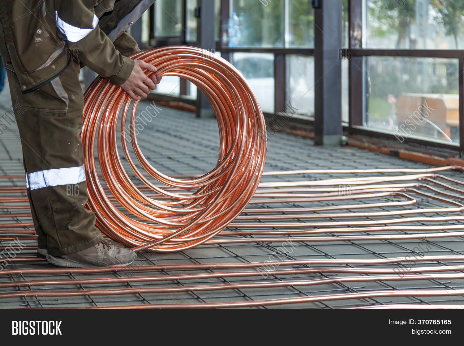 Plumber Laying Copper Image & Photo (Free Trial) | Bigstock