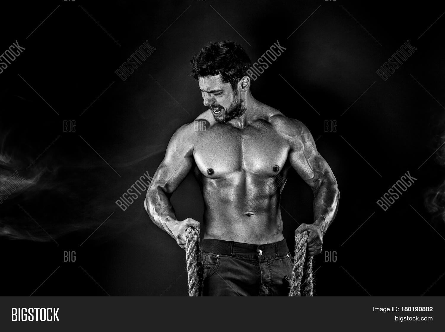 Muscular Man Holding Image & Photo (Free Trial) | Bigstock