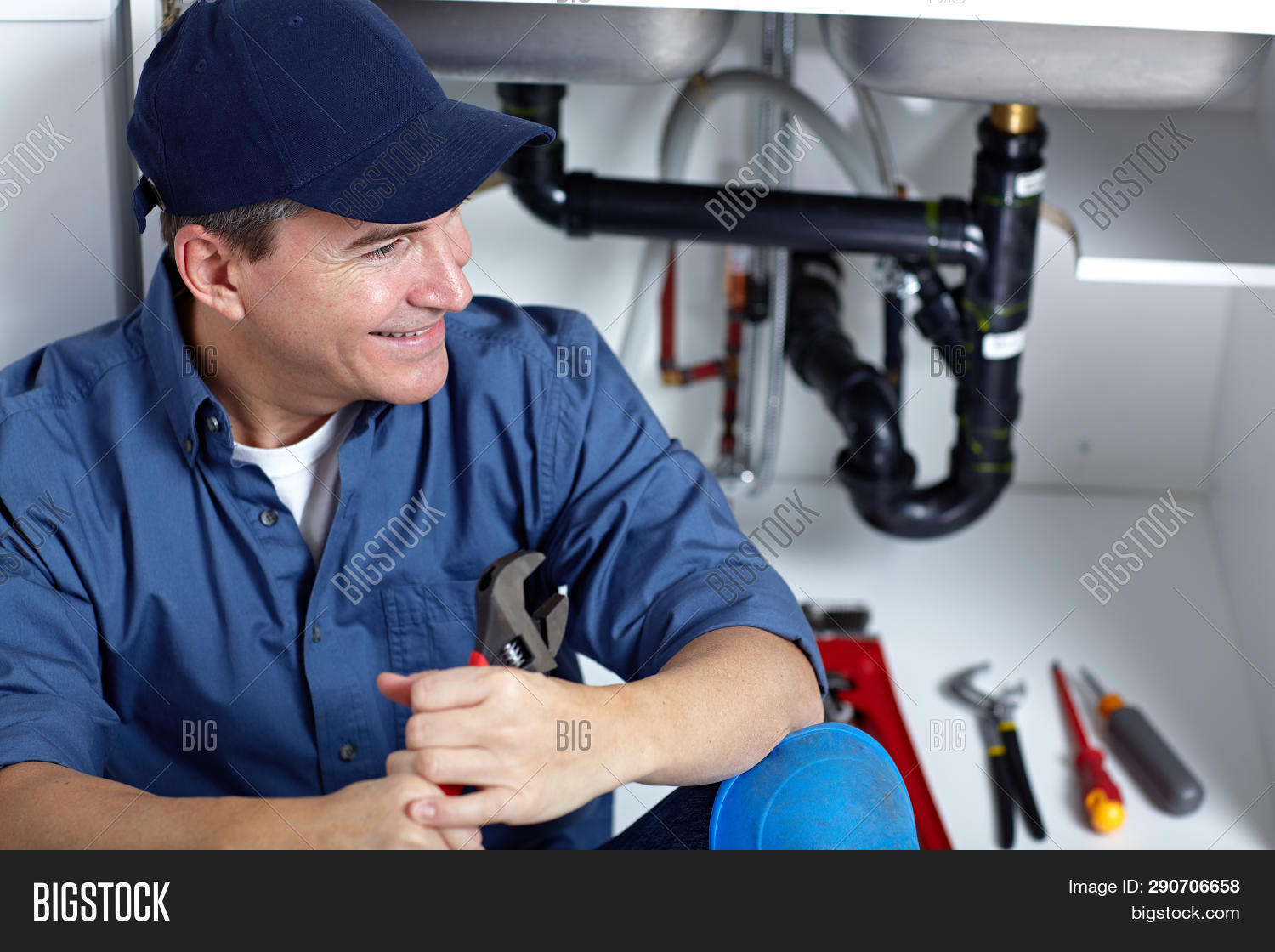 Smiling Plumber Image & Photo (Free Trial) | Bigstock