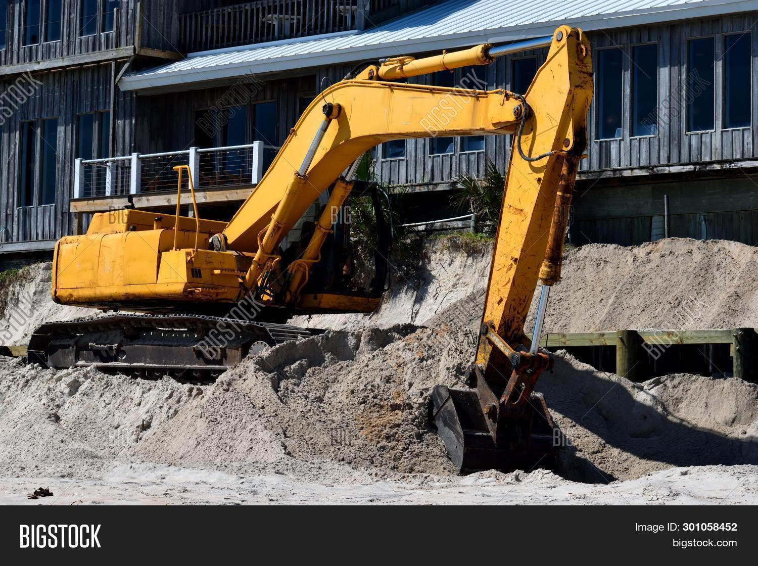 Backhoe Working Ocean Image & Photo (Free Trial) | Bigstock