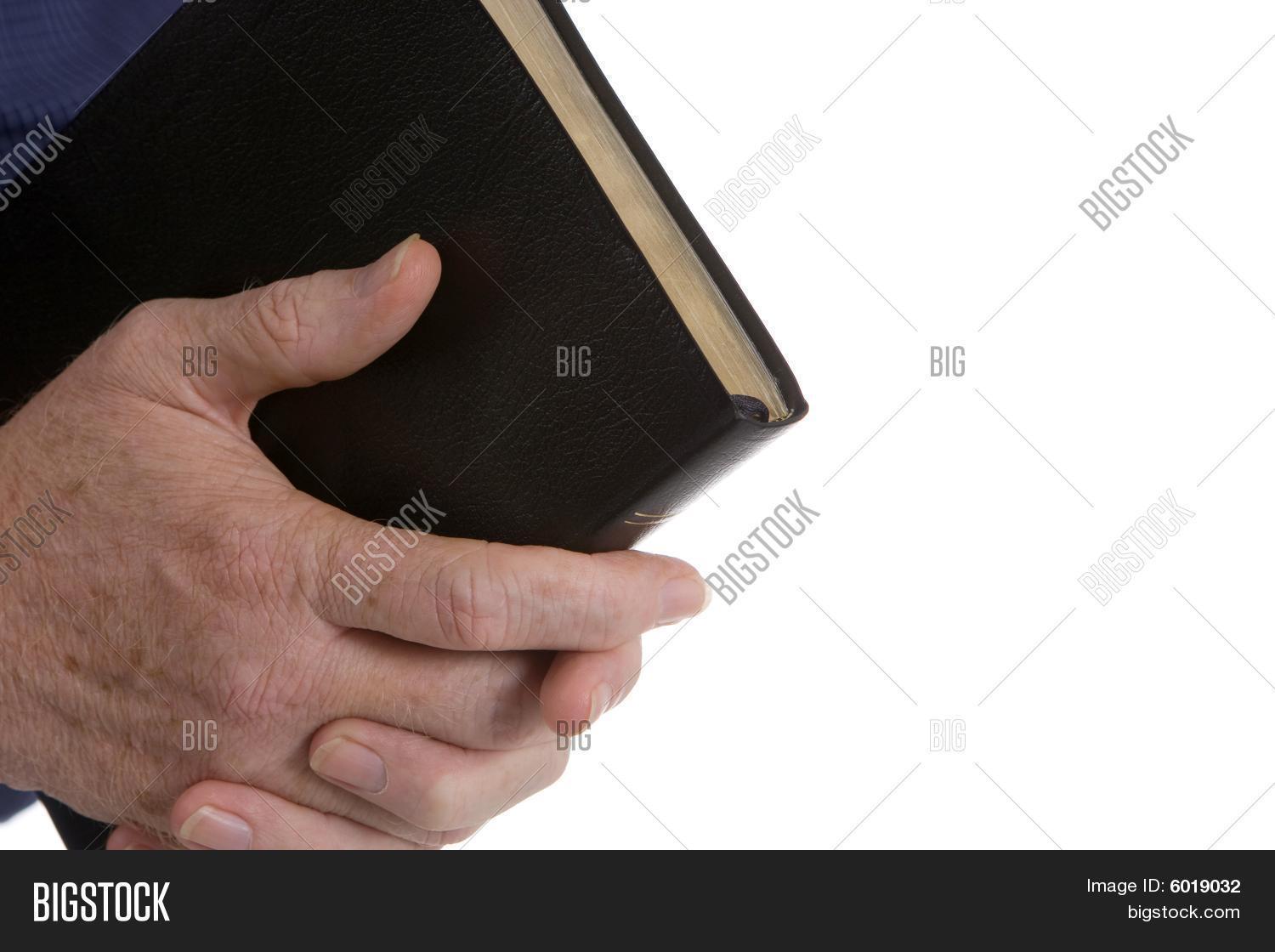 Holding Bible Image & Photo (Free Trial) | Bigstock