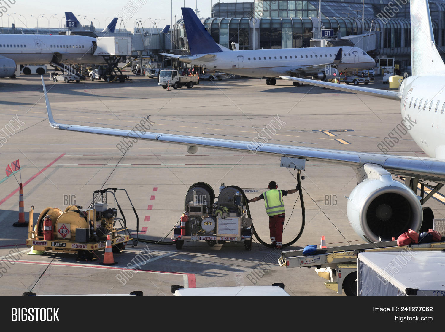 Ground Crew Refueling Image & Photo (Free Trial) | Bigstock