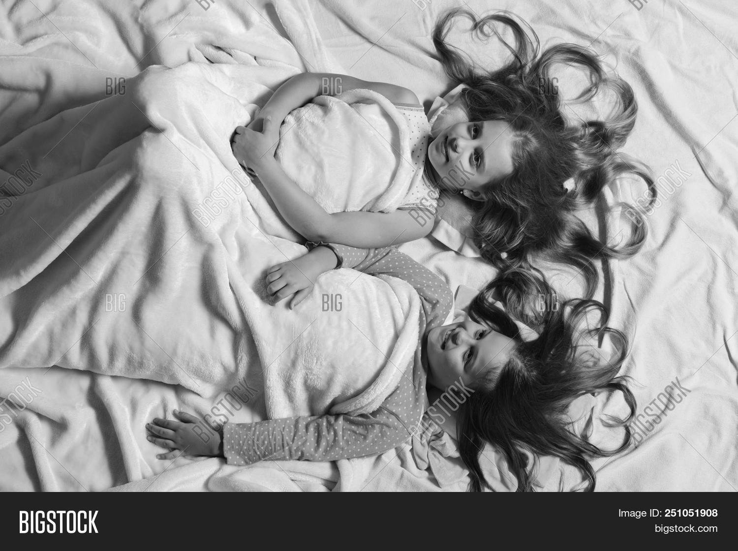 Girls Lie On White Image & Photo (Free Trial) | Bigstock