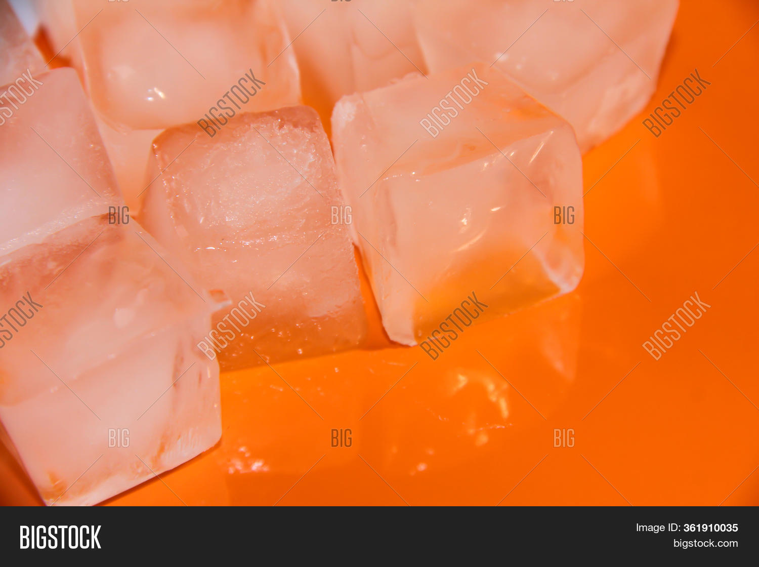 Chunks Ice On Orange Image & Photo (Free Trial) | Bigstock