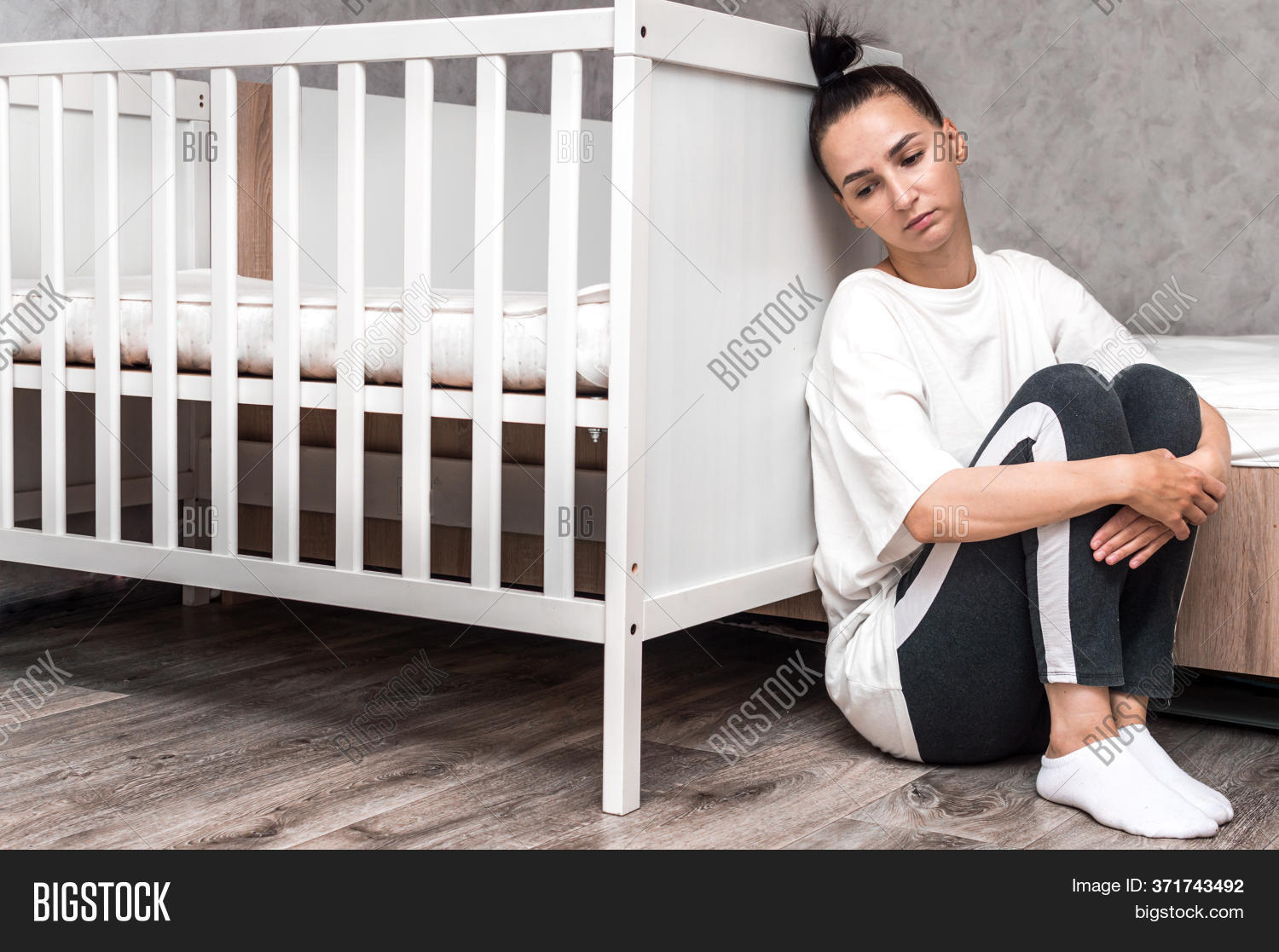 Young Woman Sits Sad Image & Photo (Free Trial) | Bigstock