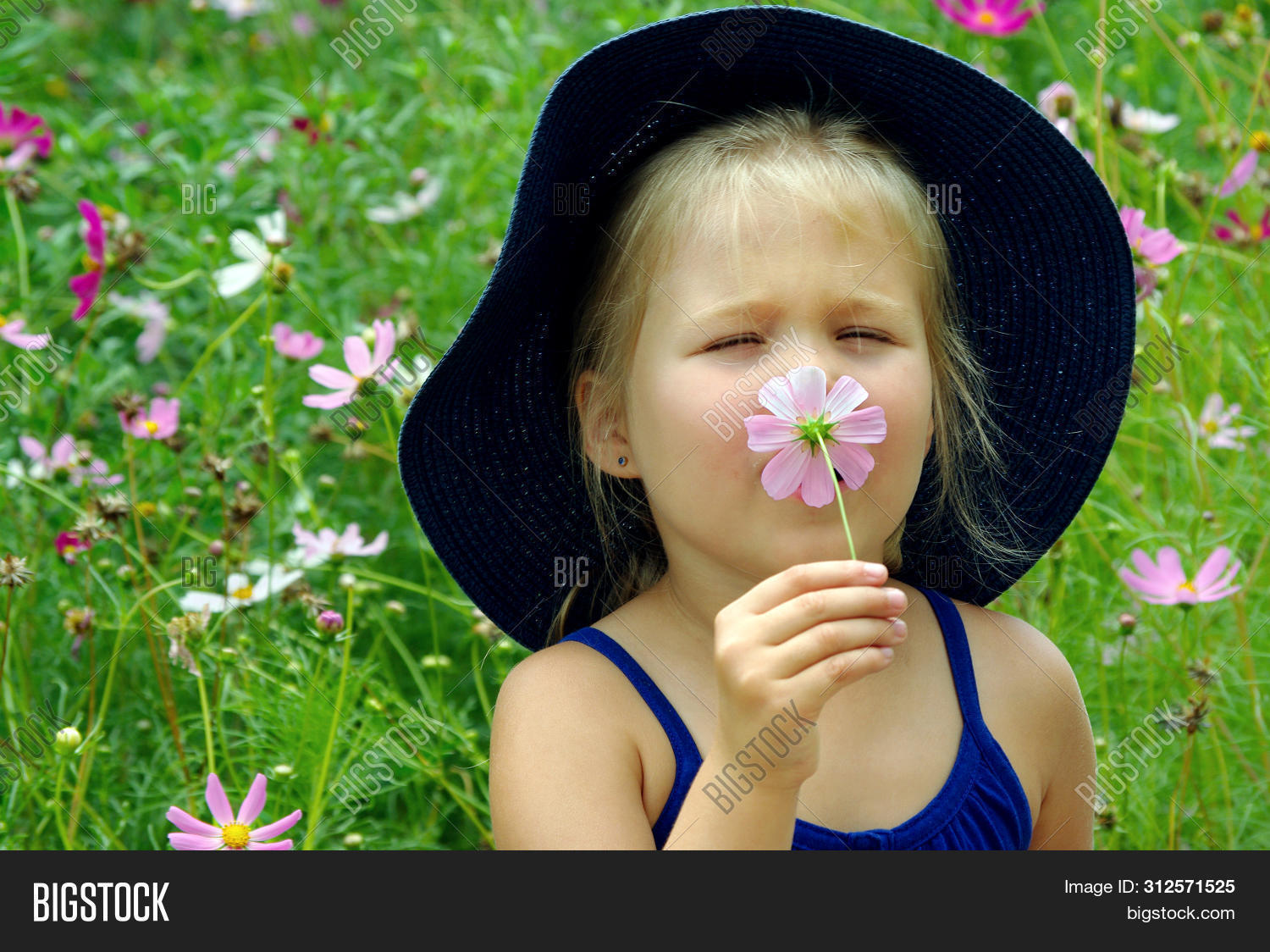 Child Sniffing Flower Image & Photo (Free Trial) | Bigstock