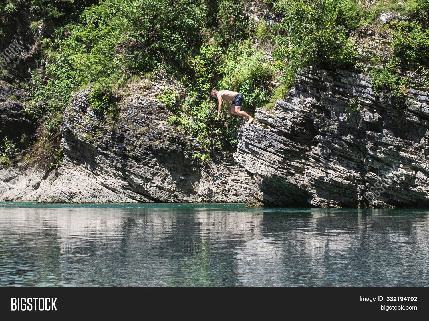 Man Jumps Cliff Into Image & Photo (Free Trial) | Bigstock