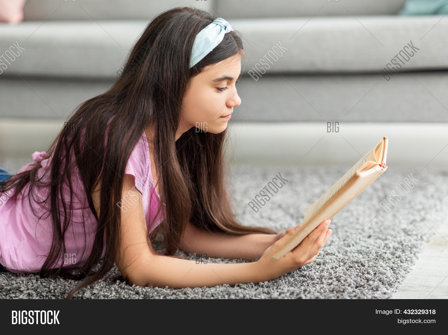 Teen Girl Reading A Book