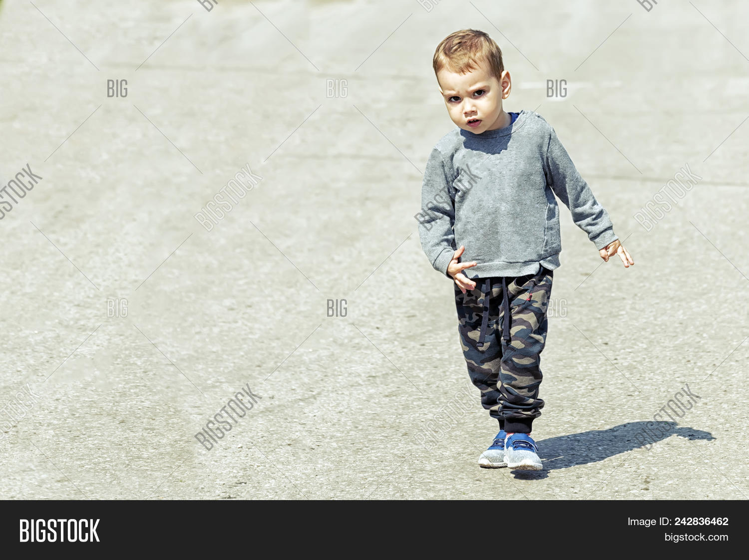 Little Boy Walks Along Image & Photo (Free Trial) | Bigstock