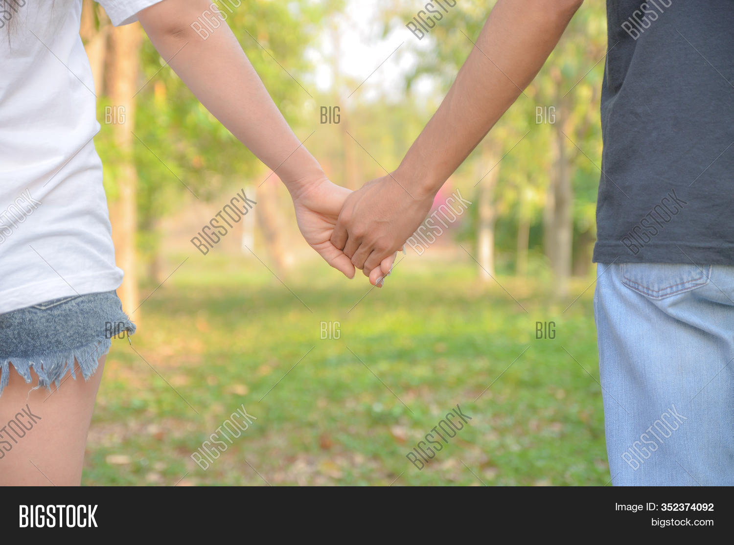 Lovers Holding Hands Walking
