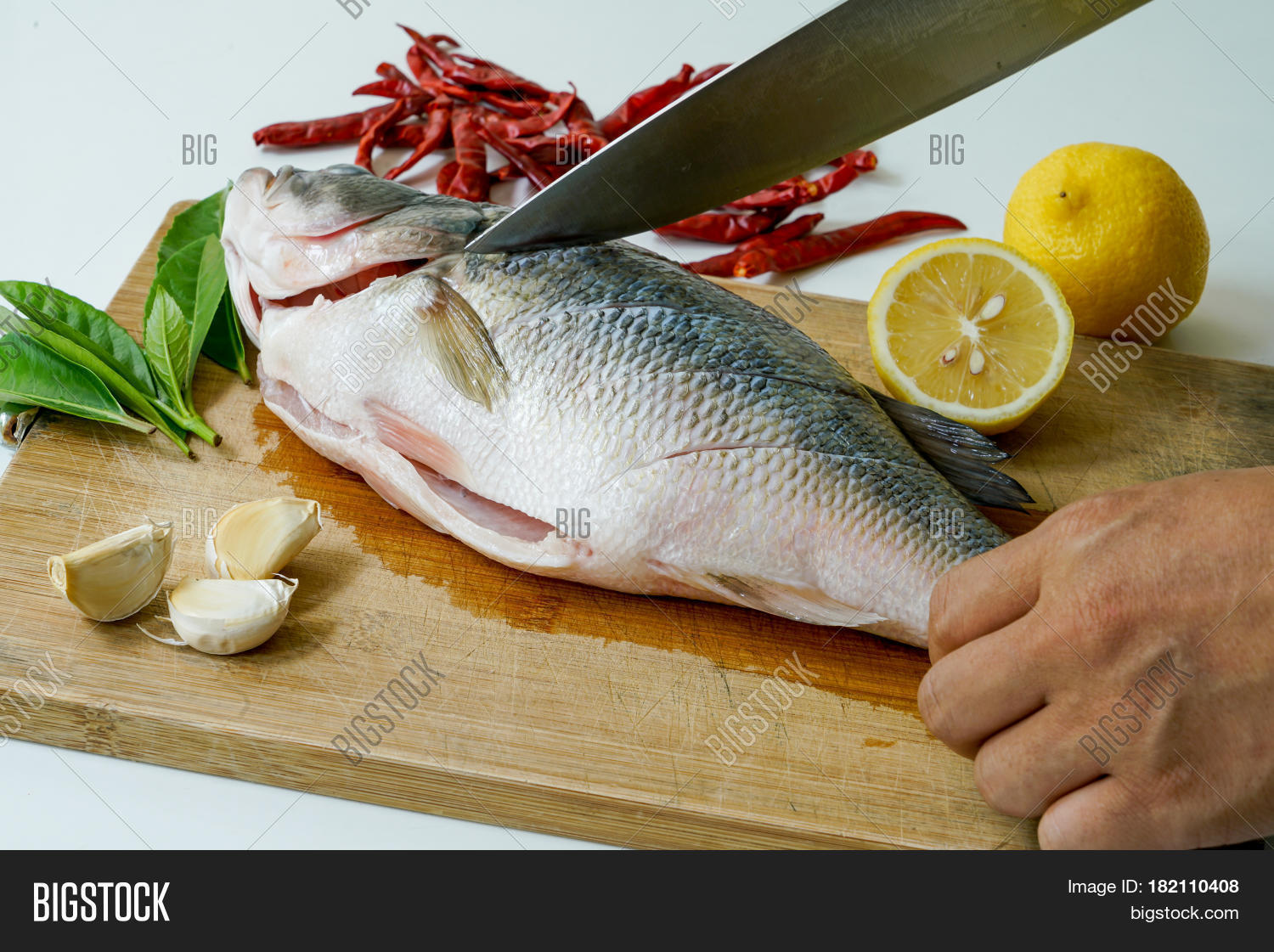 Cutting Fish Seabass Image & Photo (Free Trial) | Bigstock