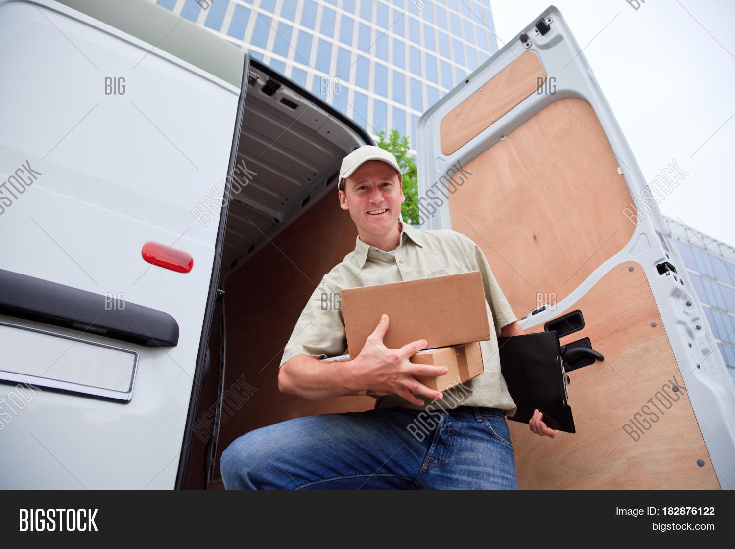 Smiling Delivery Image & Photo (Free Trial) | Bigstock