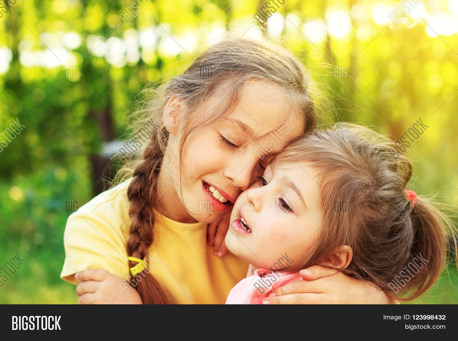 Little Girls Hugging