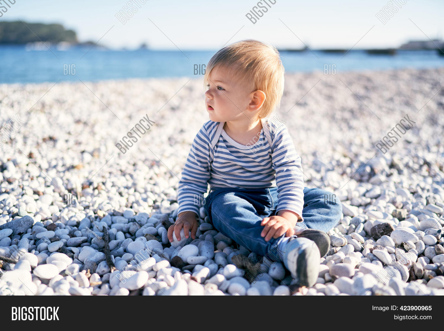Kid Sits On Pebble Image & Photo (Free Trial) | Bigstock