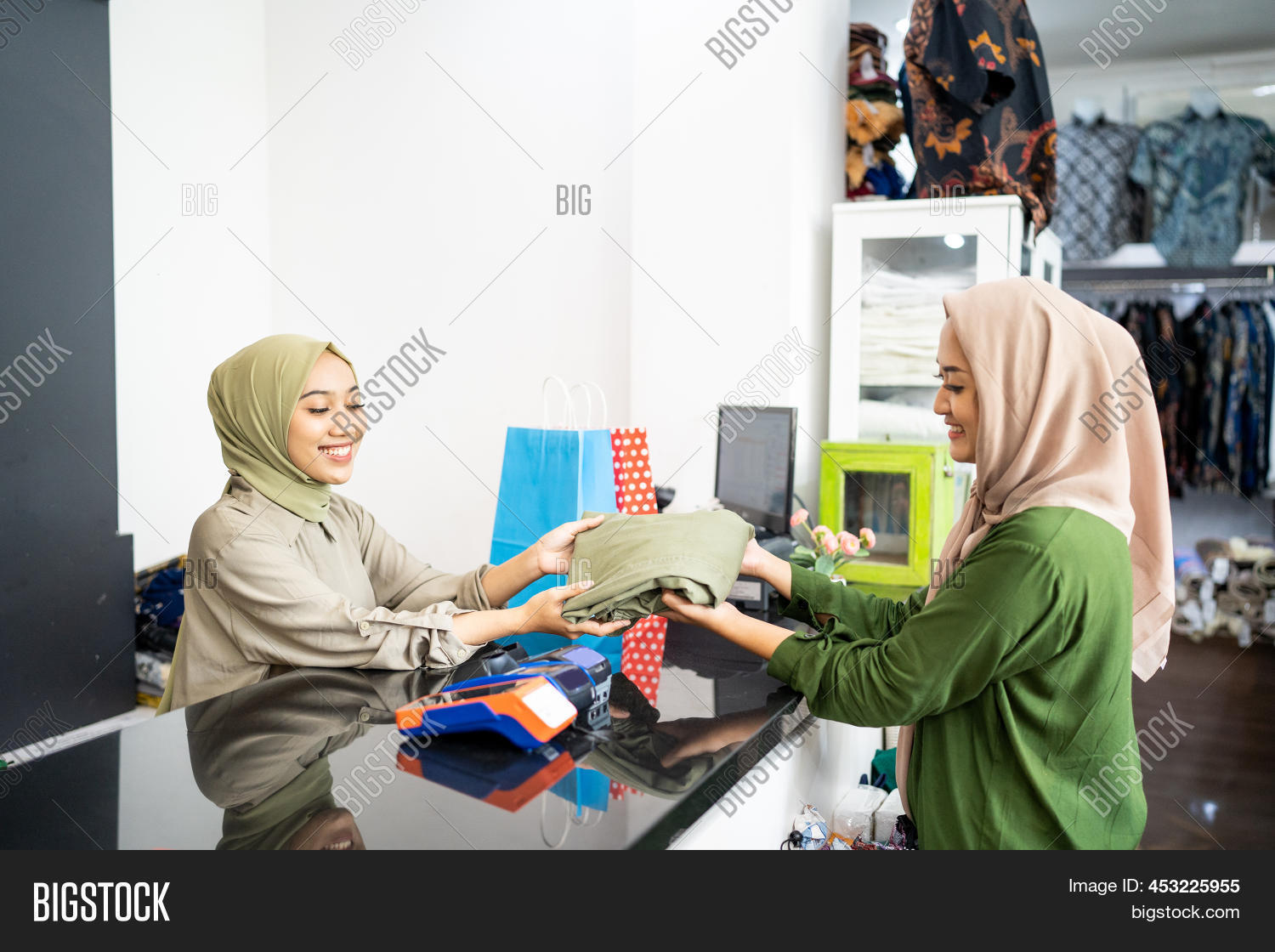 Muslim Cashier Worker Image & Photo (Free Trial) | Bigstock