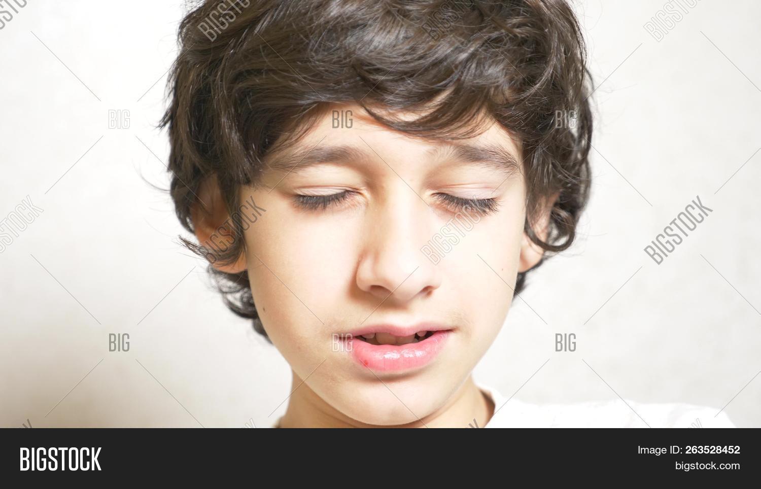 Young Boy Looks Camera Image & Photo (Free Trial) | Bigstock