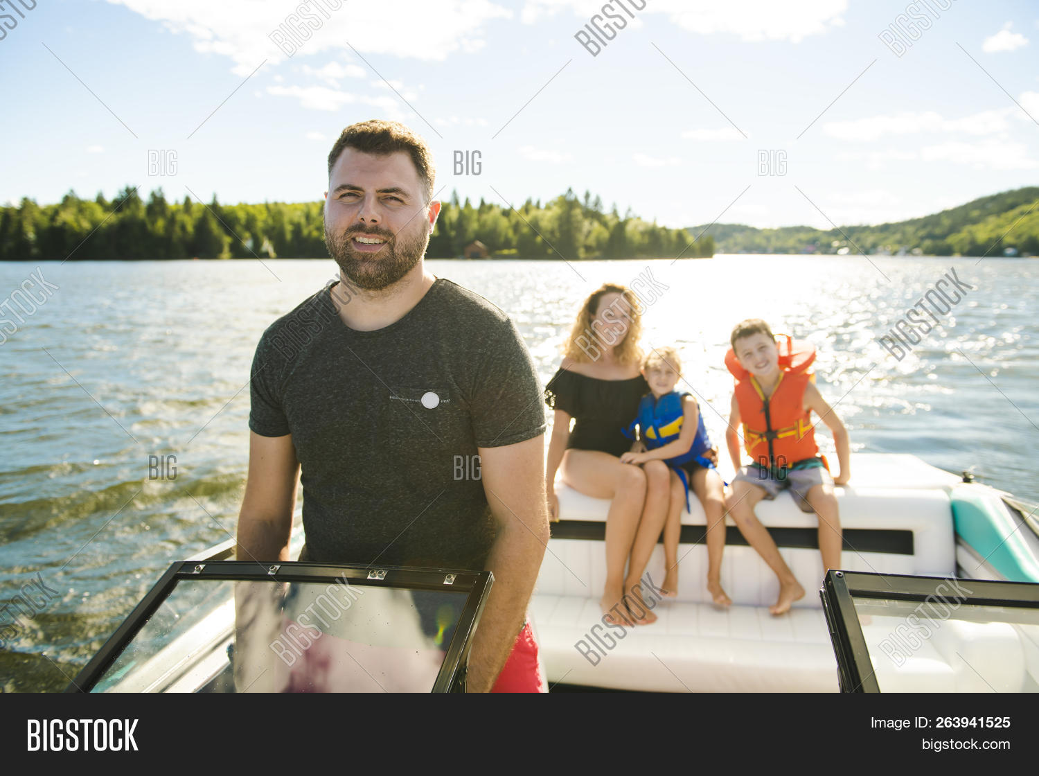 Man Driving Boat On Image & Photo (Free Trial) | Bigstock