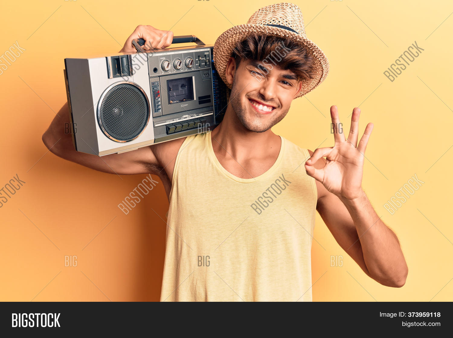Man Holding Boombox