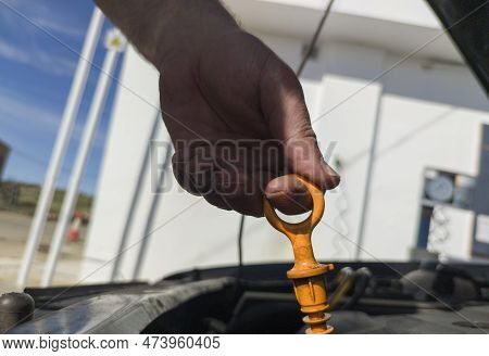 Man Checking His Oil Image & Photo (Free Trial) | Bigstock