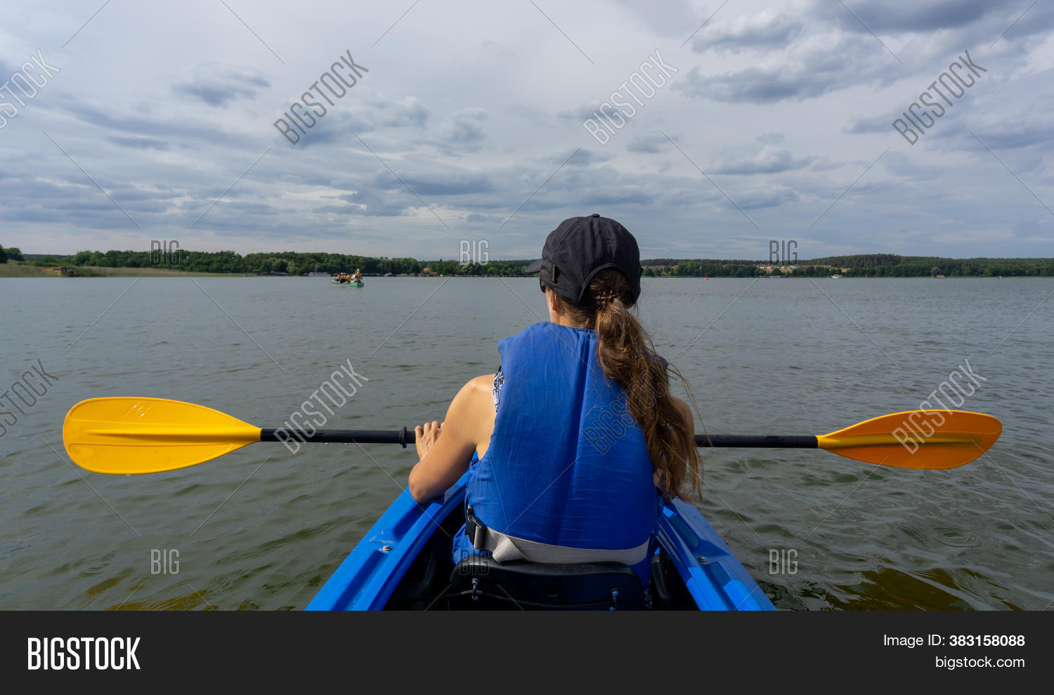 Female Kayaker On Lake Image & Photo (Free Trial) | Bigstock