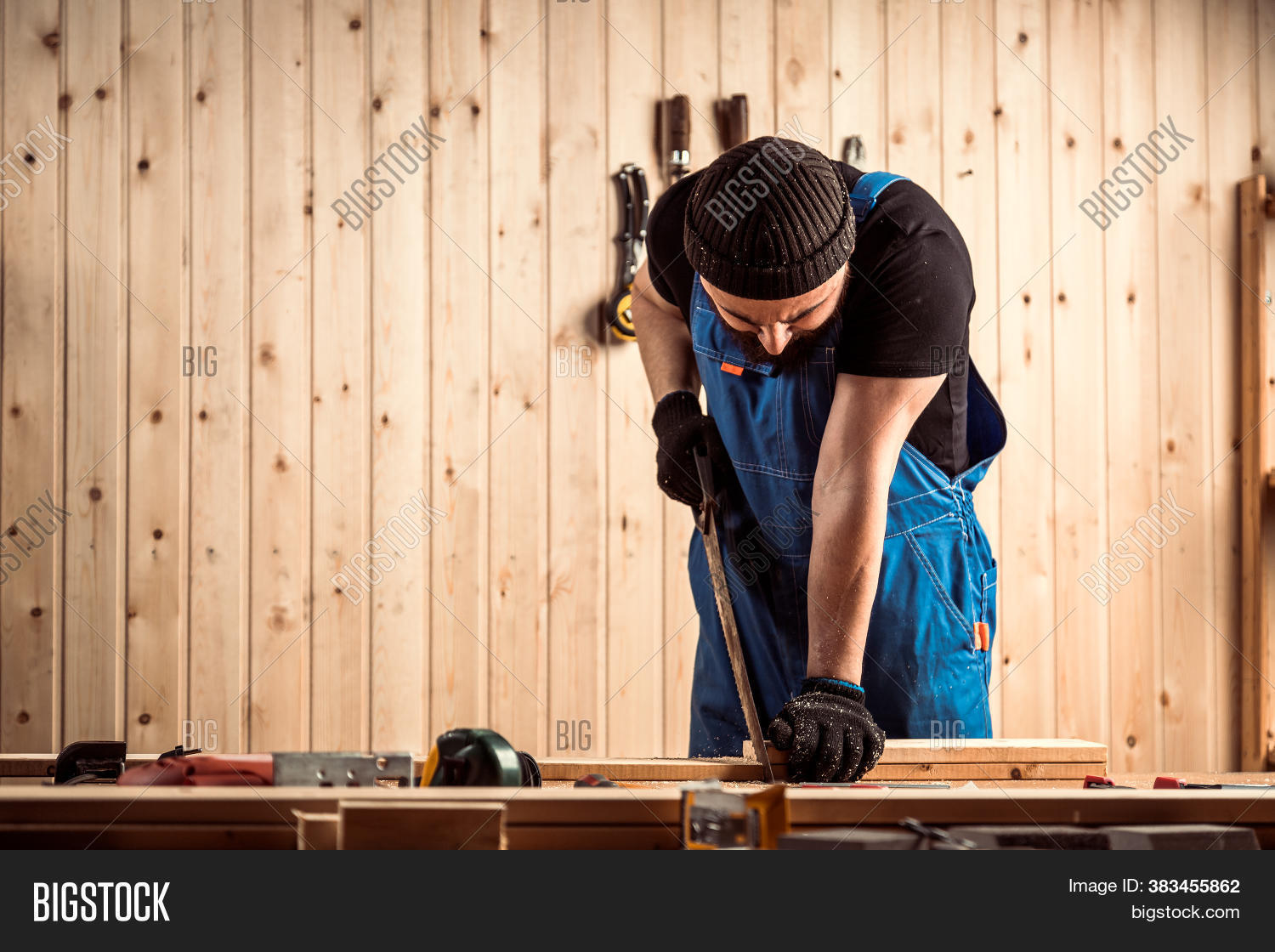 Carpenter Sawing Wood Image & Photo (Free Trial) | Bigstock
