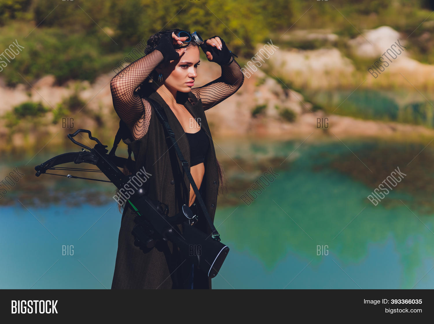 Woman Holding Crossbow