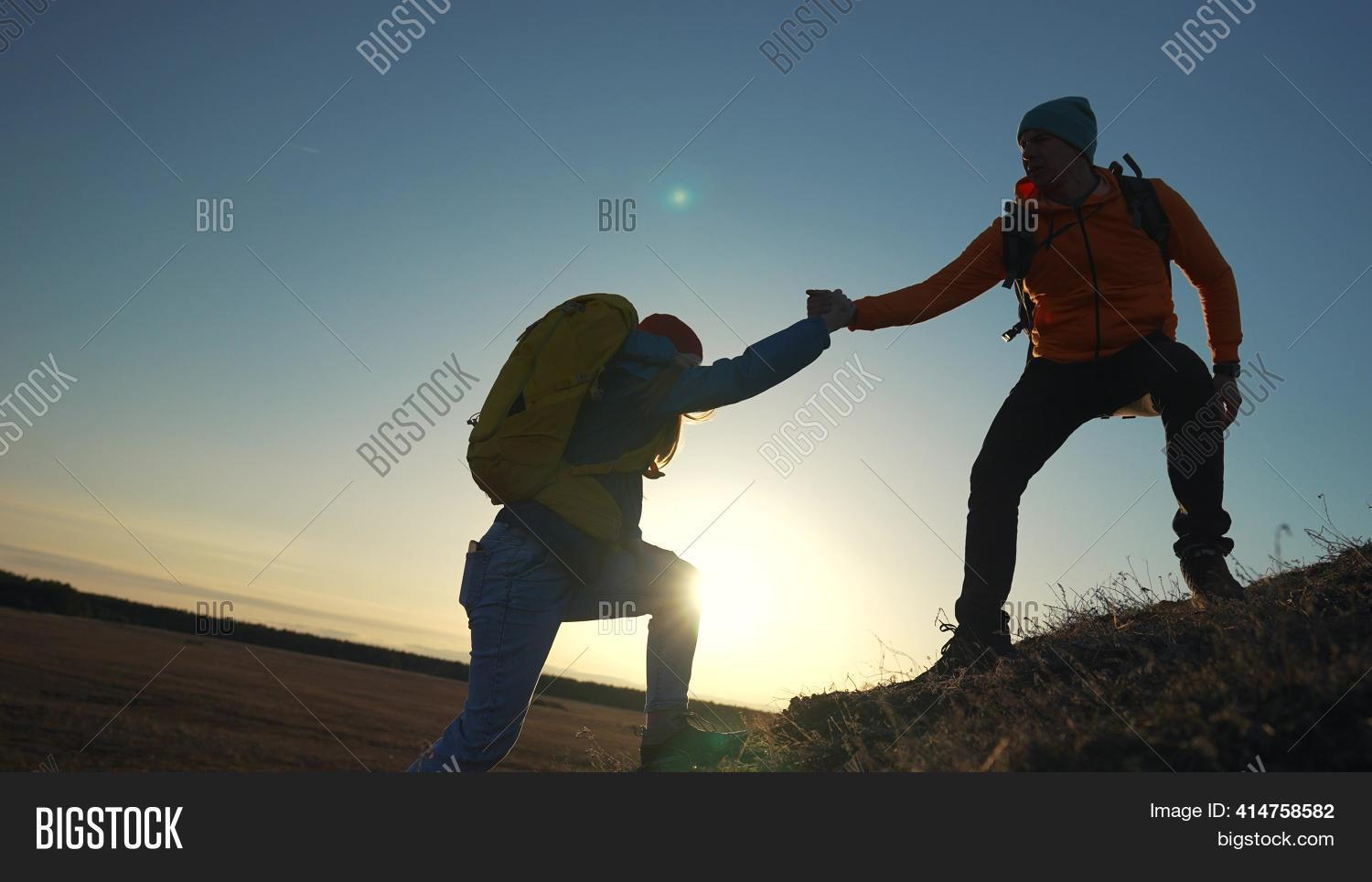 Teamwork. Help Image & Photo (Free Trial) | Bigstock