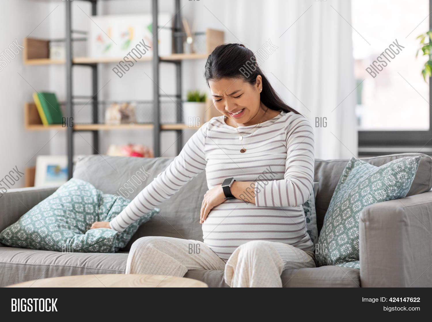 Pregnant Women In Labor Pain At Home