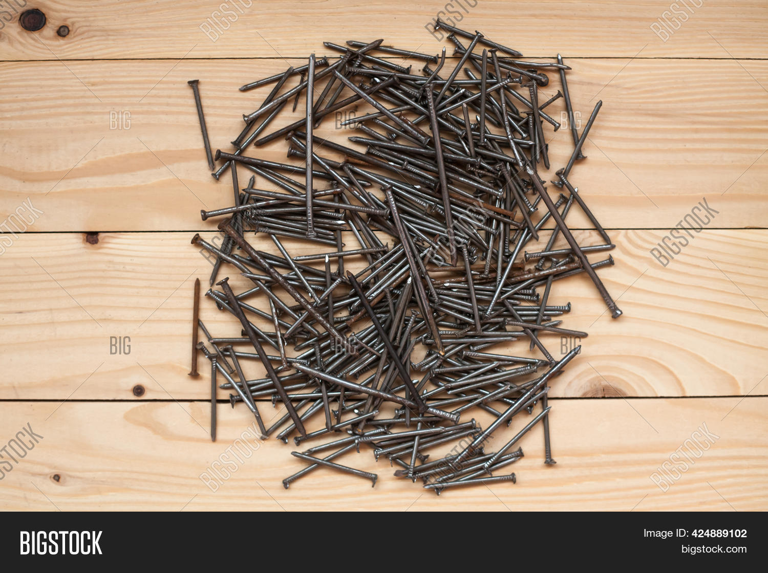 Iron Nail In Wood