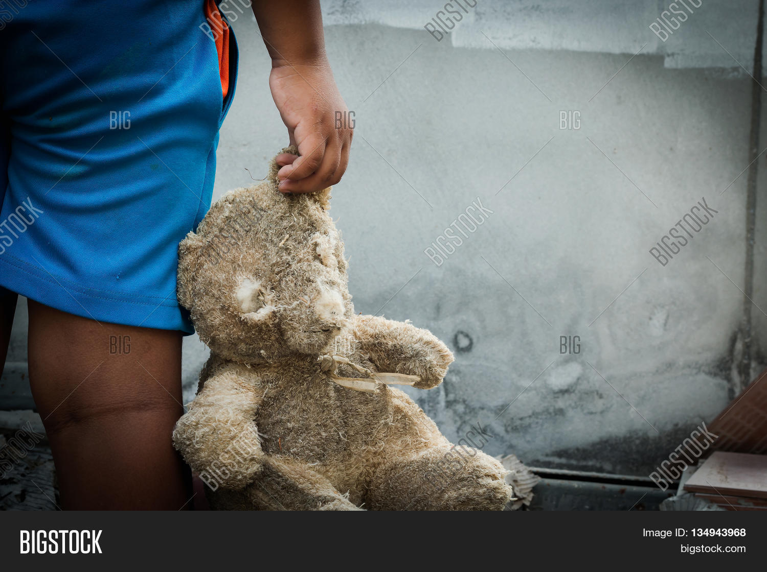 Poor Child Holding Image & Photo (Free Trial) | Bigstock