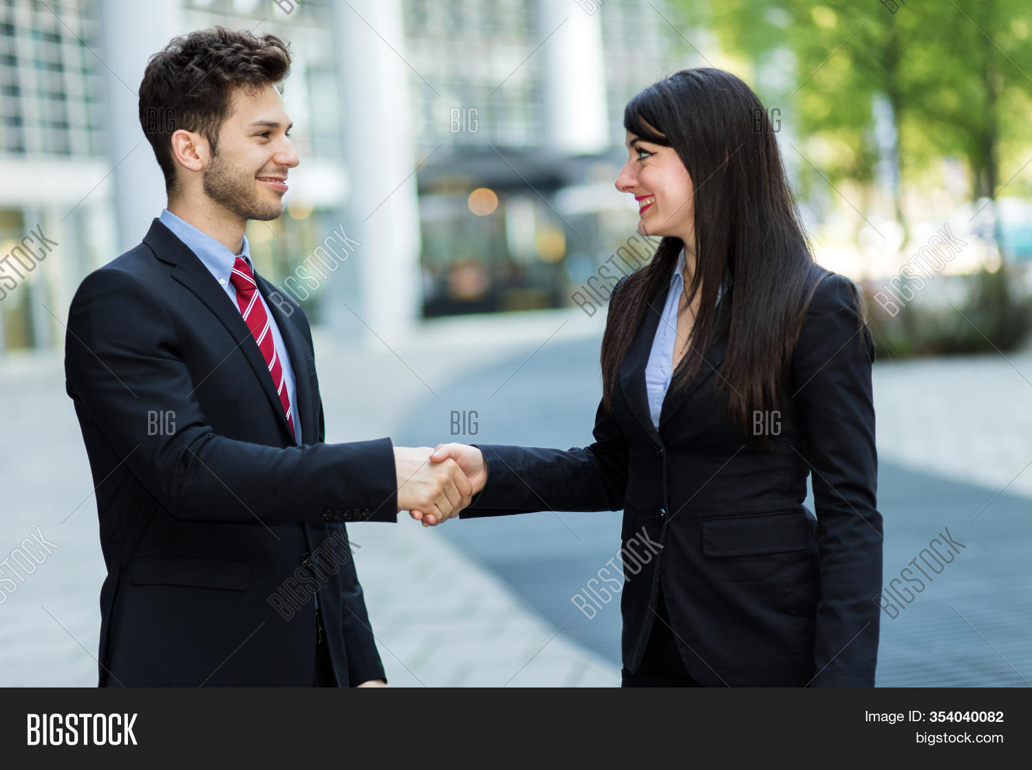Handshake Between Image & Photo (Free Trial) | Bigstock