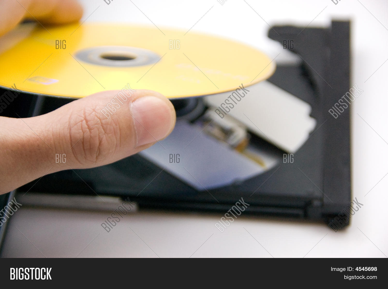 Putting Dvd Player Image & Photo (Free Trial) | Bigstock