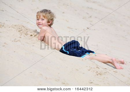 Boy Laying Sand Bottom Image & Photo (Free Trial) | Bigstock