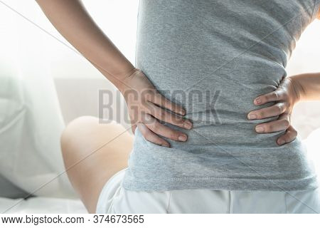Person Touching Lower Image & Photo (Free Trial) | Bigstock
