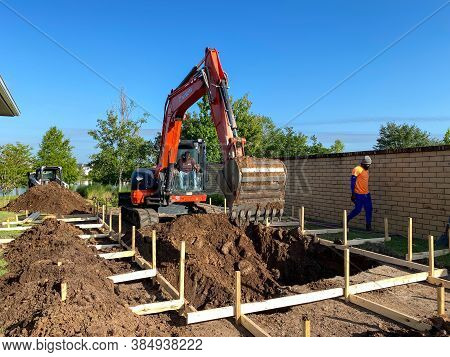 Backhoe Digging Hole Image & Photo (Free Trial) | Bigstock