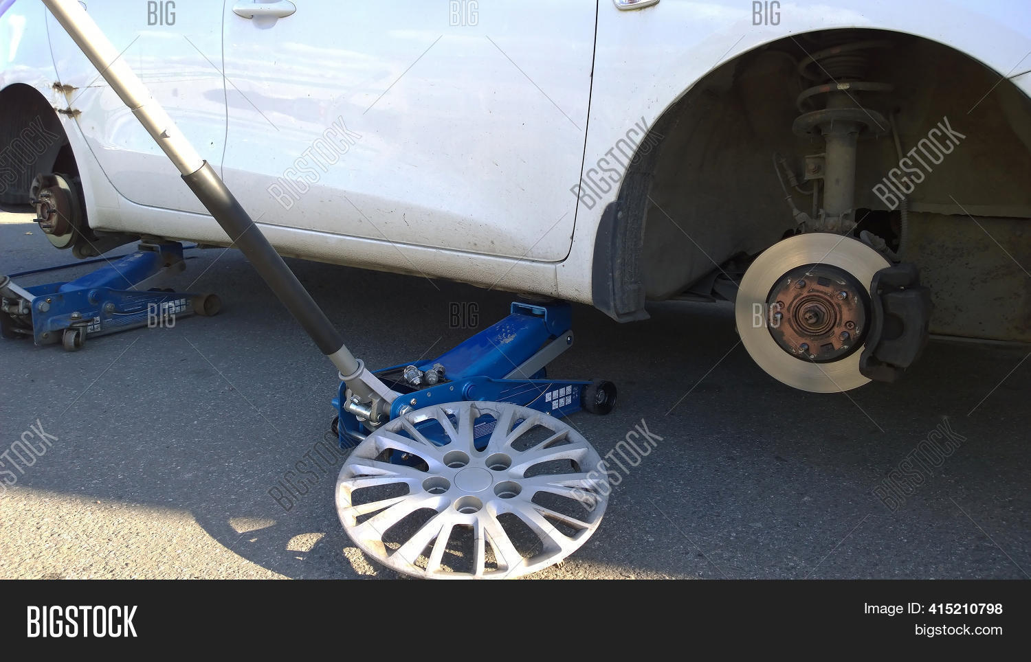 Car Raised On Jack. Image & Photo (Free Trial) | Bigstock