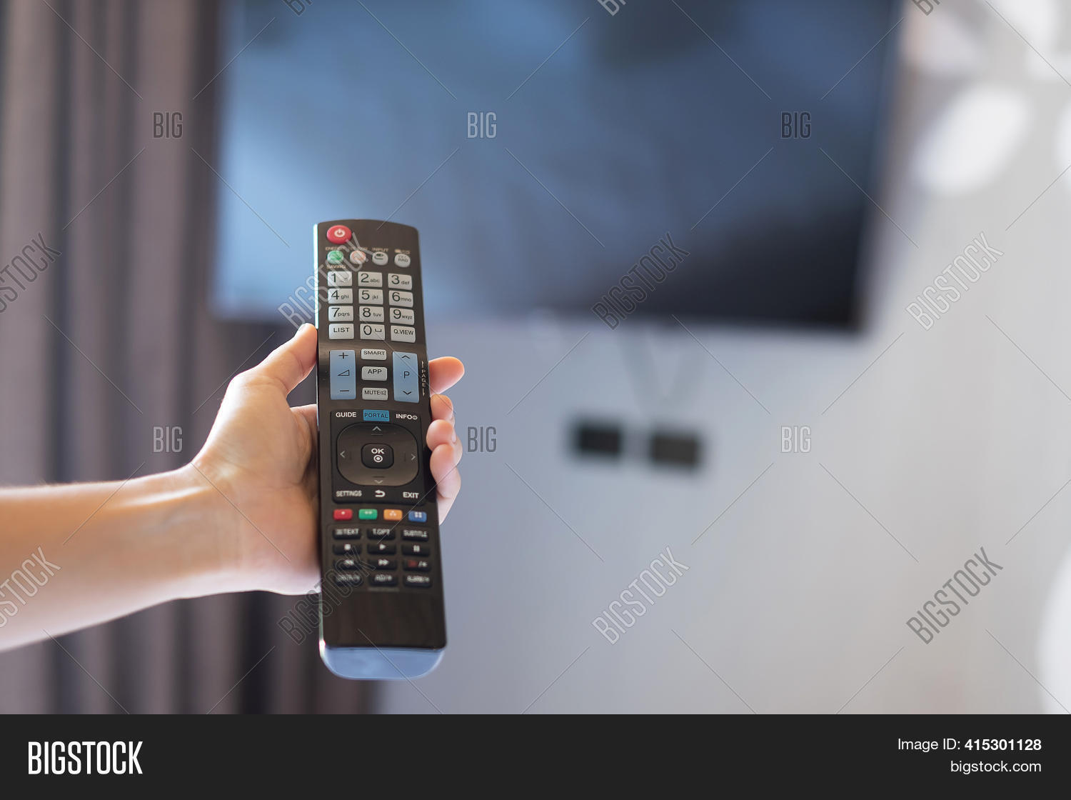Hand Using Remote Image & Photo (Free Trial) | Bigstock