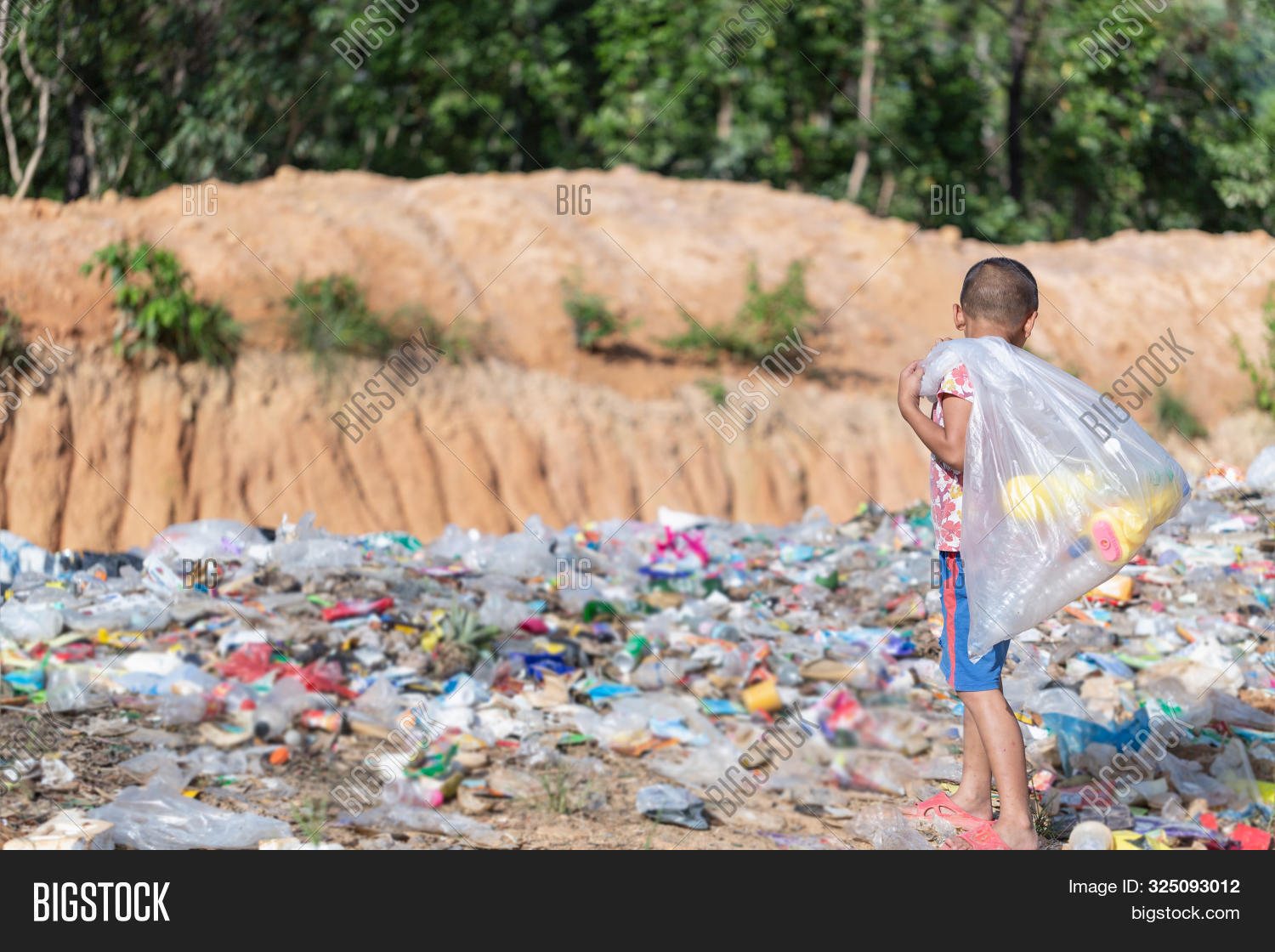 Poor Boy Collecting Image & Photo (Free Trial) | Bigstock