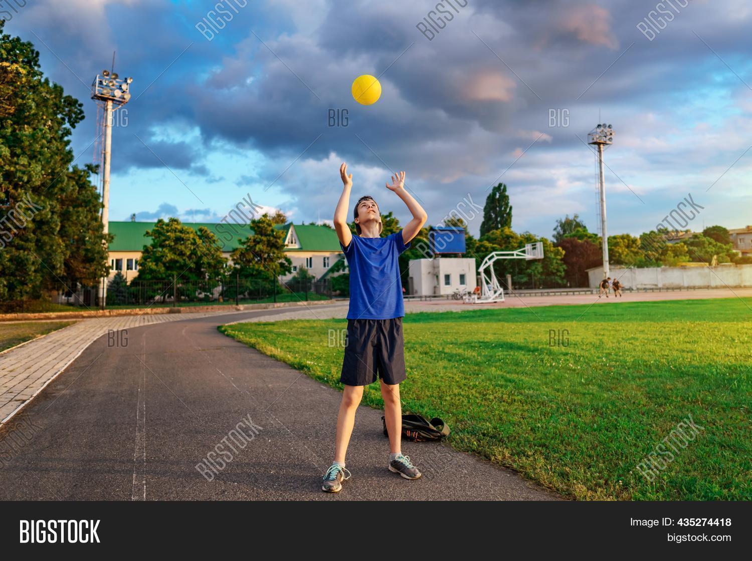 Teen Boy Playing Ball Image & Photo (Free Trial) | Bigstock