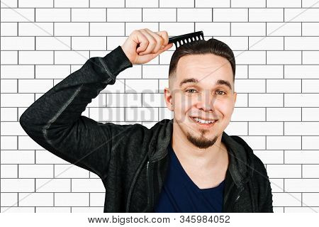 Man Combs His Hair Image & Photo (Free Trial) | Bigstock